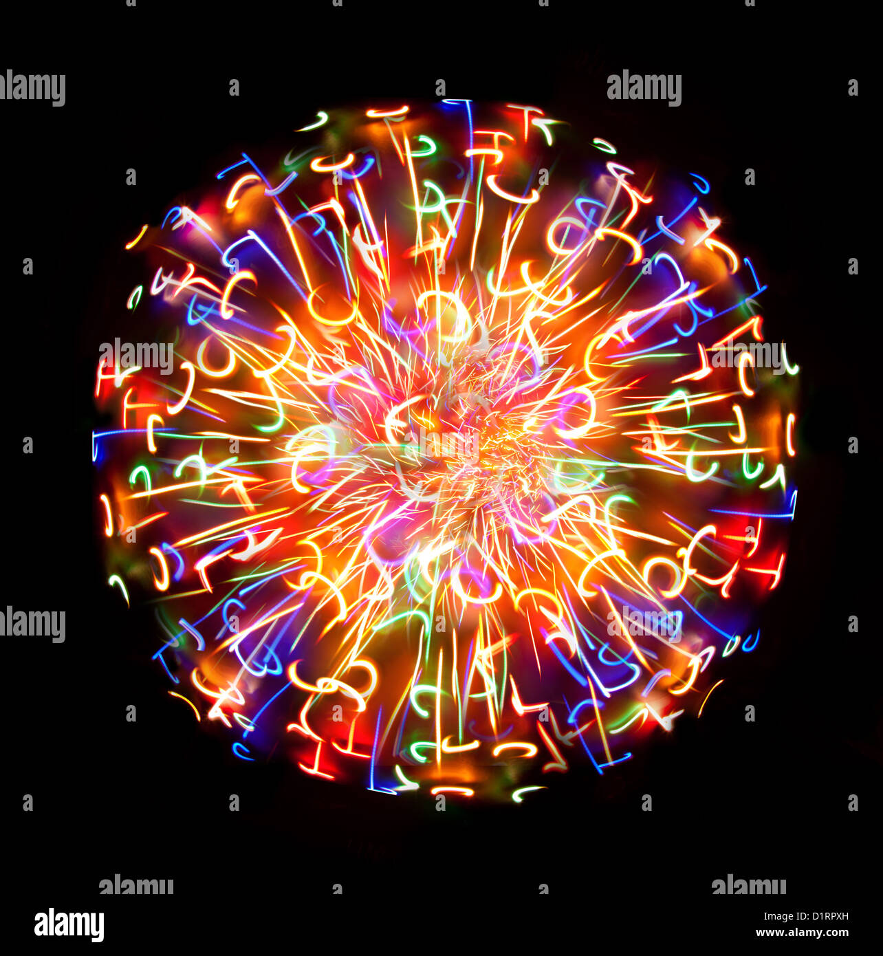 Multi-coloured light sphere on a black background Stock Photo - Alamy