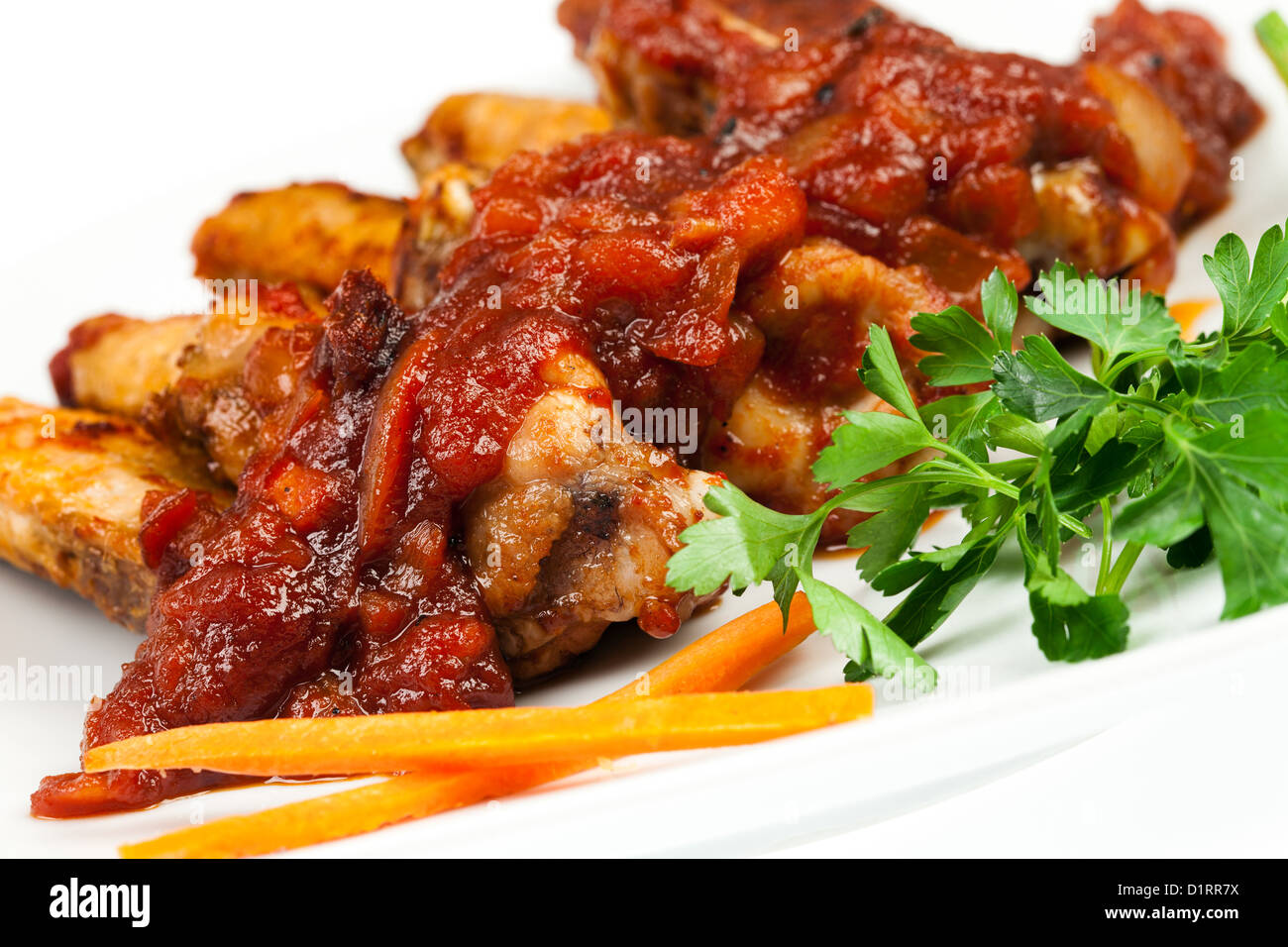 chicken wings on a white background Stock Photo - Alamy