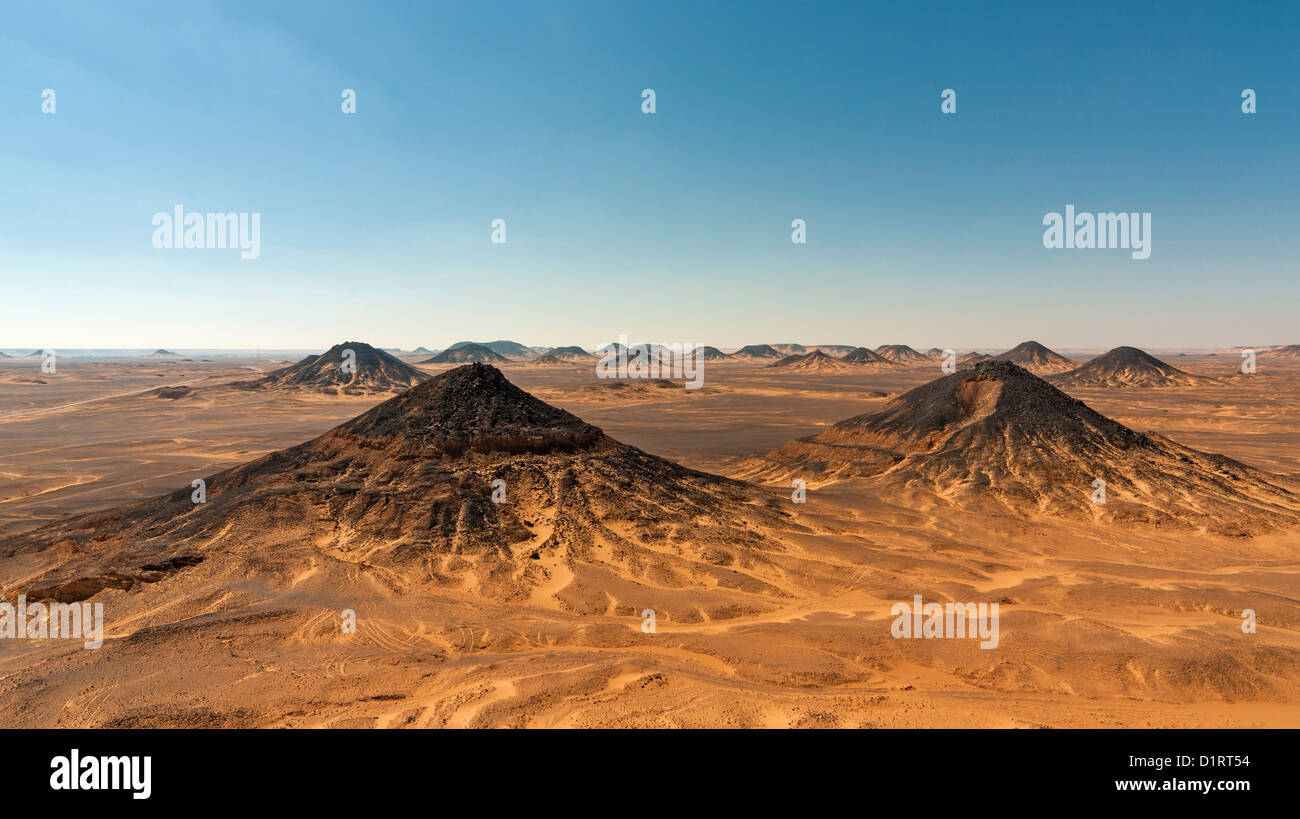 Volcano-shaped Pyramid Mountains of Black Desert, Egypt Stock Photo - Alamy