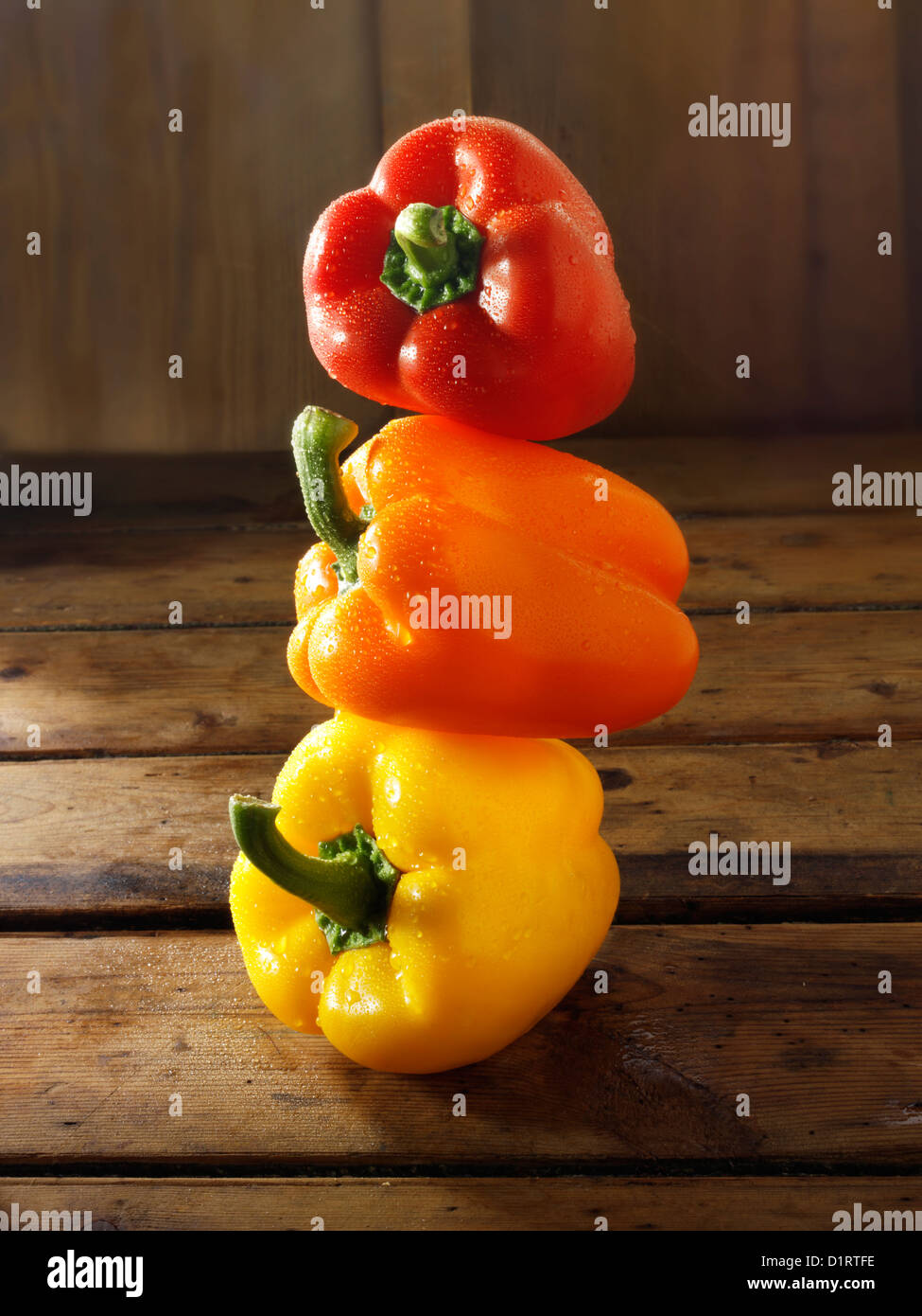 Mixed red, yellow & orange fresh bell peppers photos, pictures & images ...
