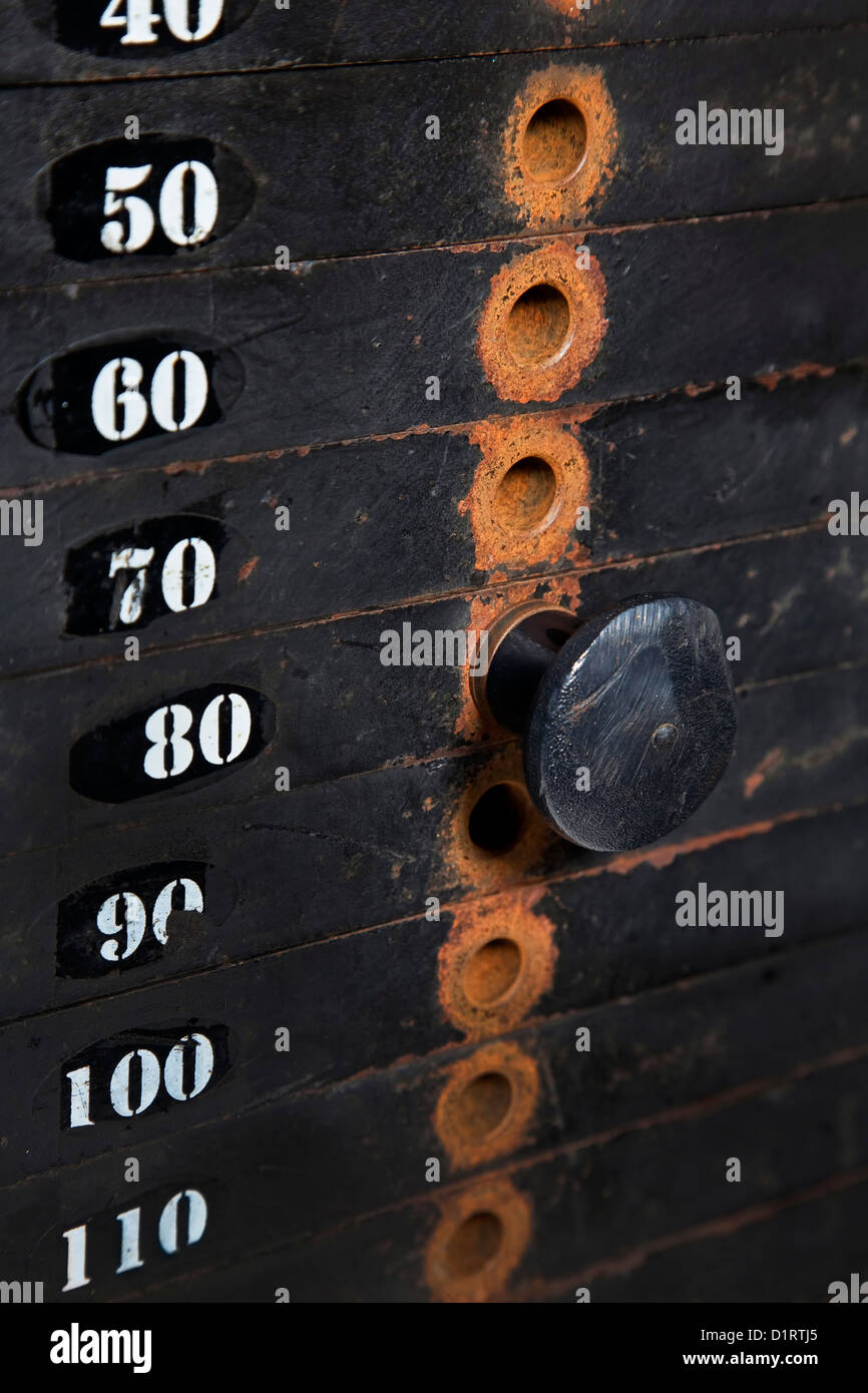 Old rusty weight stack in a gym Stock Photo - Alamy