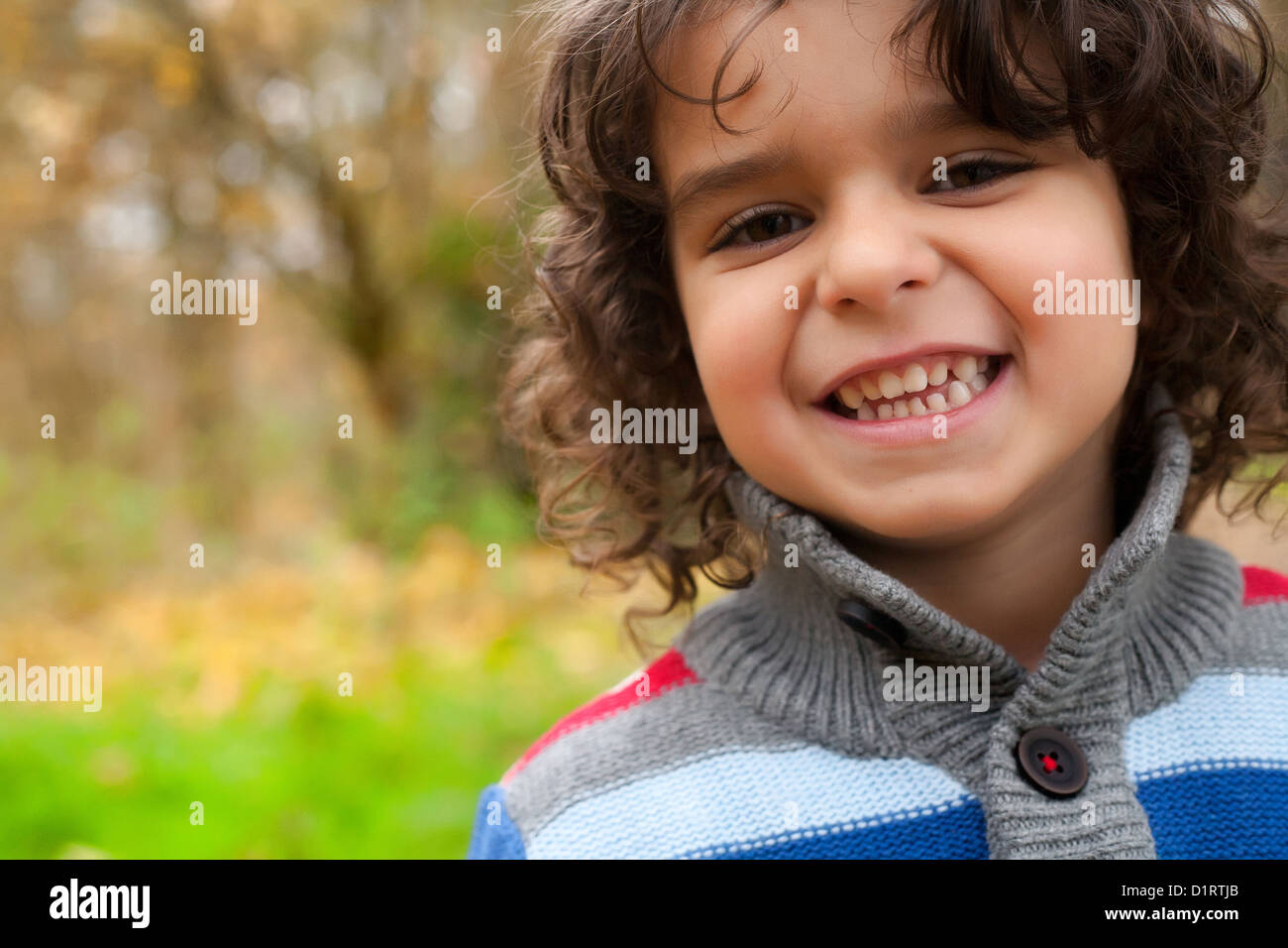 Happy foster children in the forest are having fun Stock Photo - Alamy