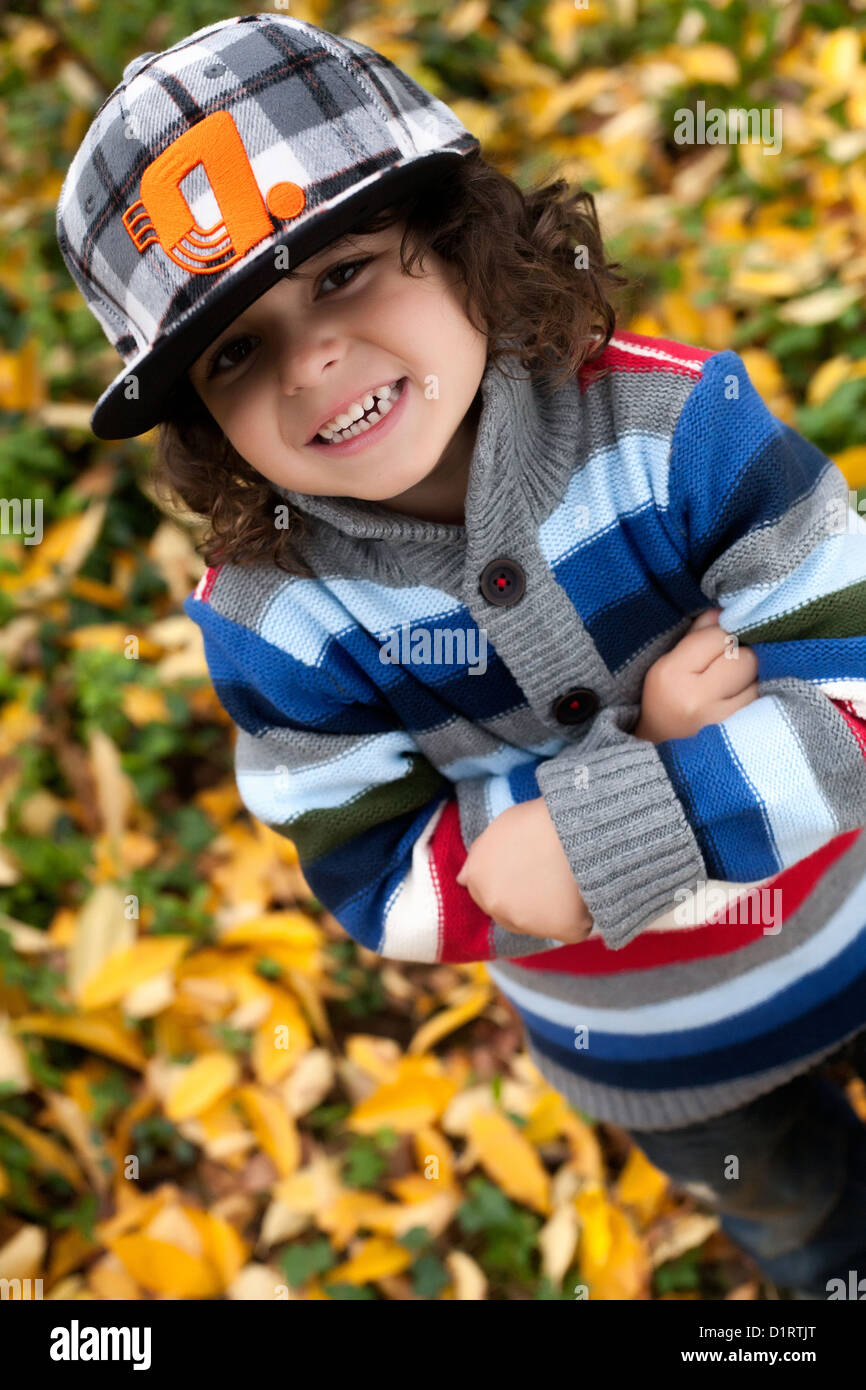 Happy foster children in the forest are having fun Stock Photo - Alamy