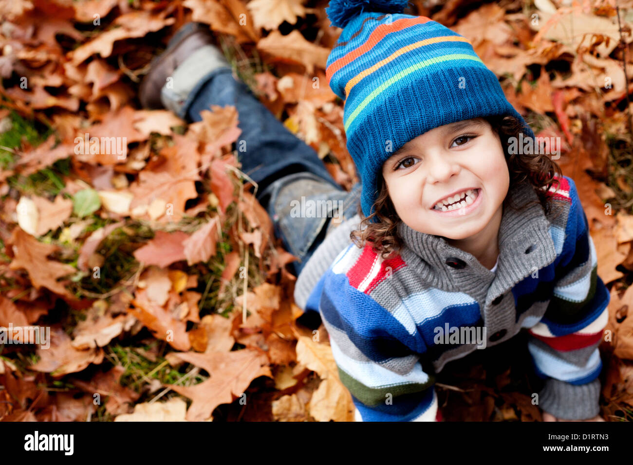 Happy foster children in the forest are having fun Stock Photo - Alamy