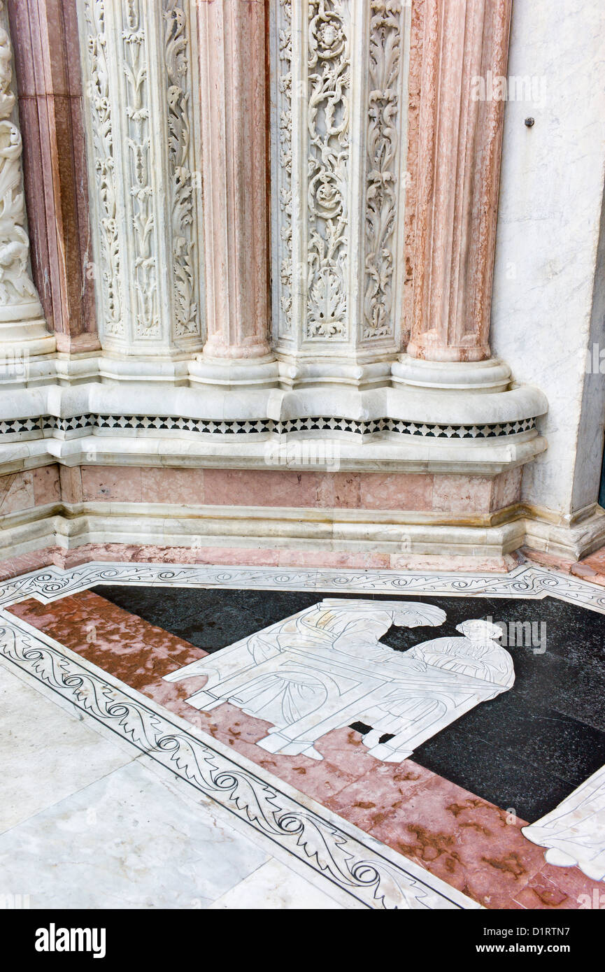 Detail of decorative stone carving in coloured marble pavement and ...