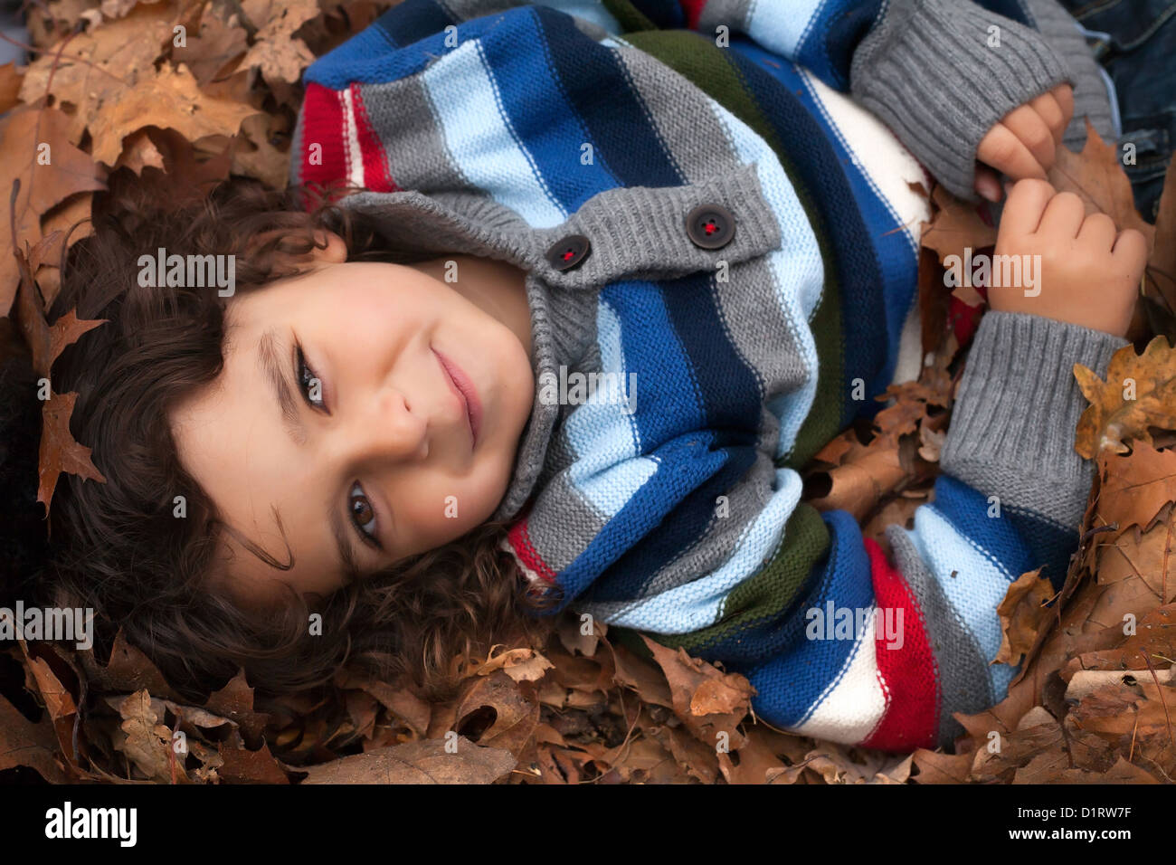 Happy foster children in the forest are having fun Stock Photo - Alamy