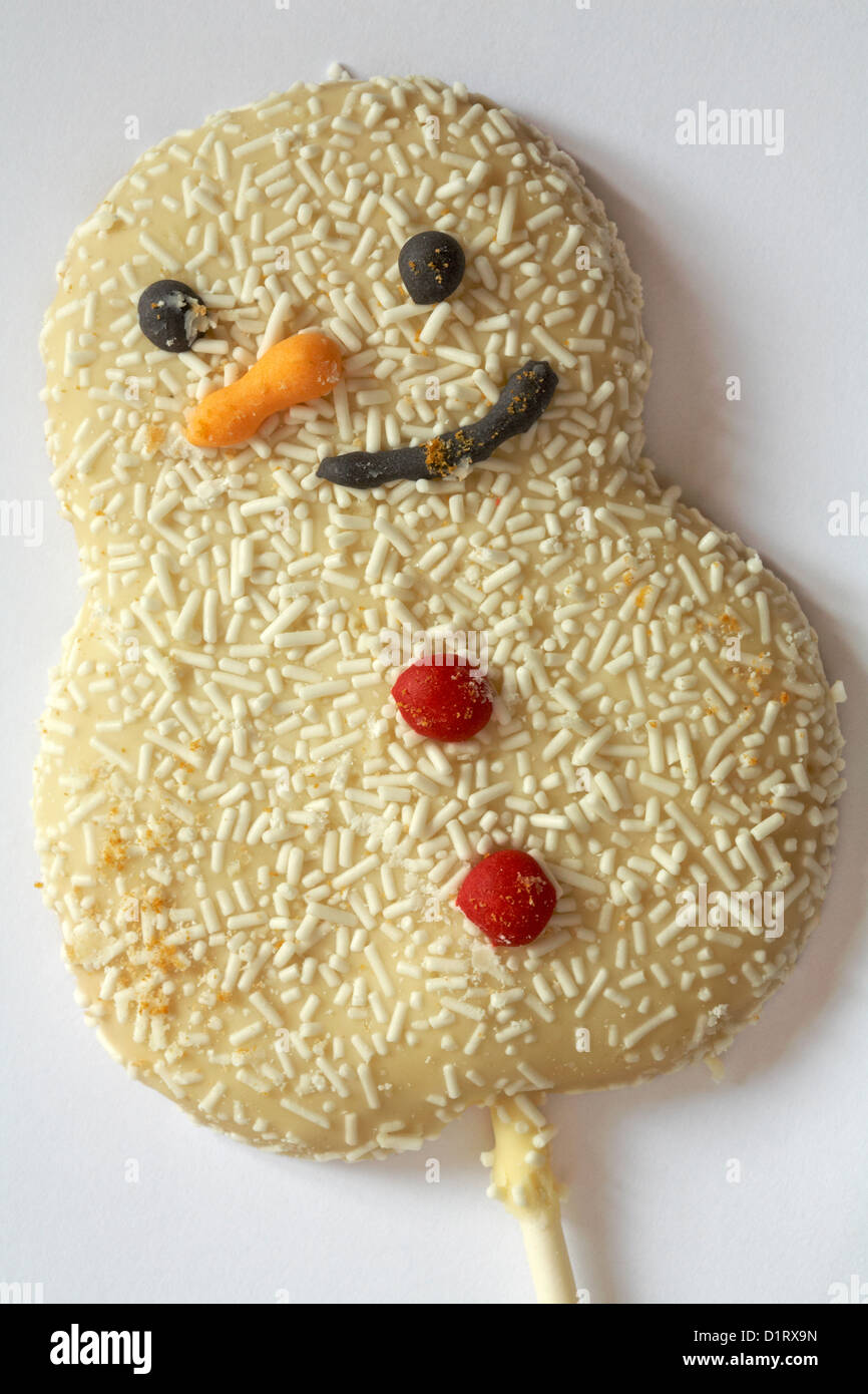 Snowman biscuit lolly on stick set against white background Stock Photo ...