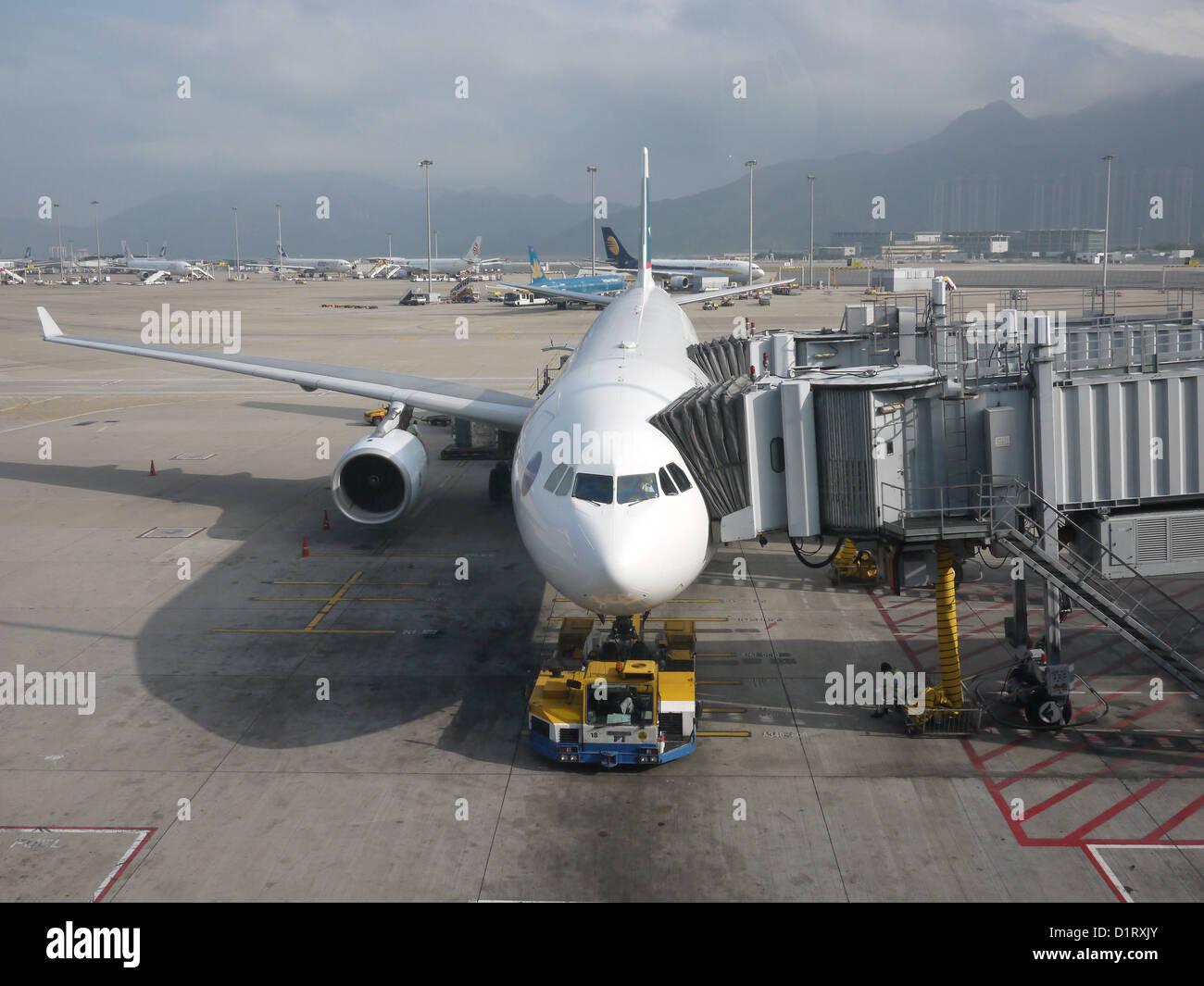 airplane parked at the gate Stock Photo - Alamy