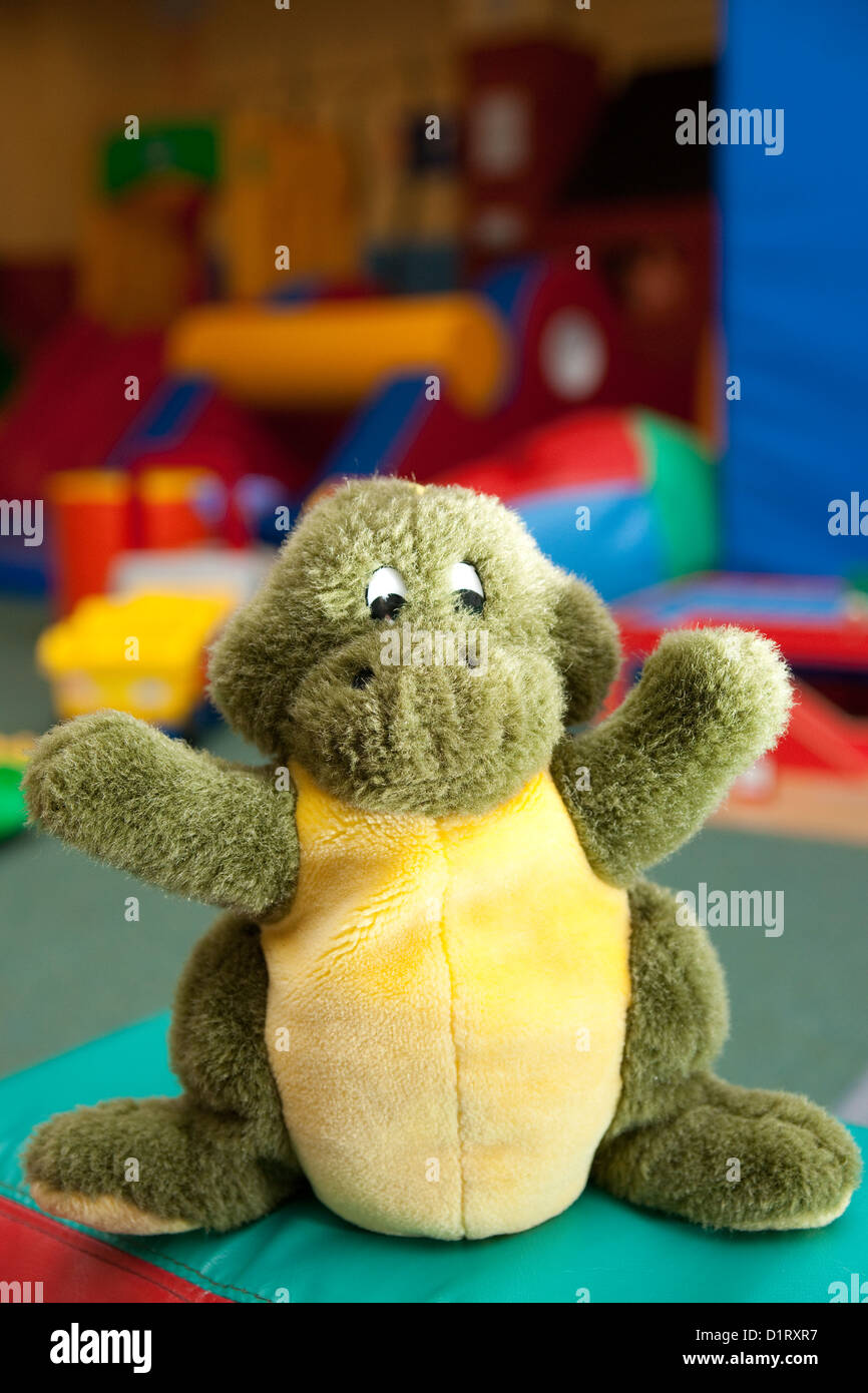 Children's Green Dinosaur Soft Cuddly Teddy Toy Stock Photo - Alamy