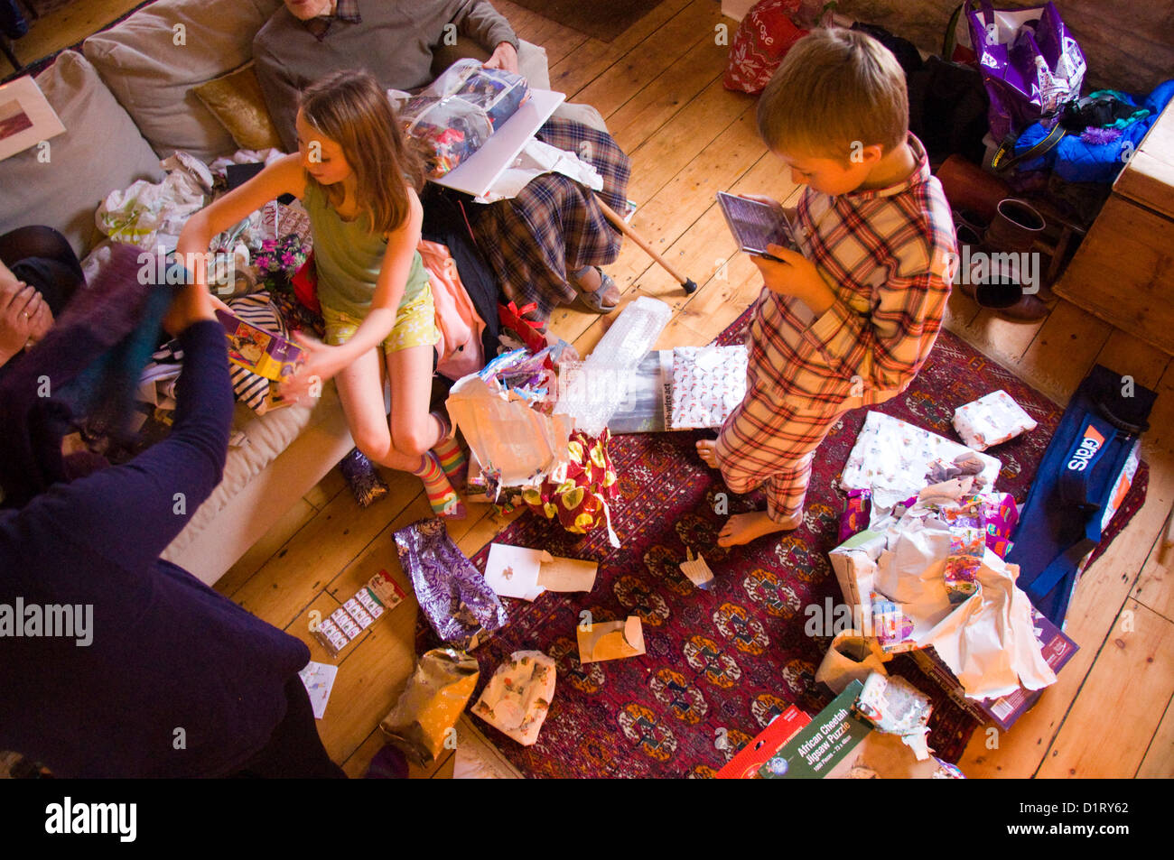 Christmas Day opening presents Stock Photo - Alamy