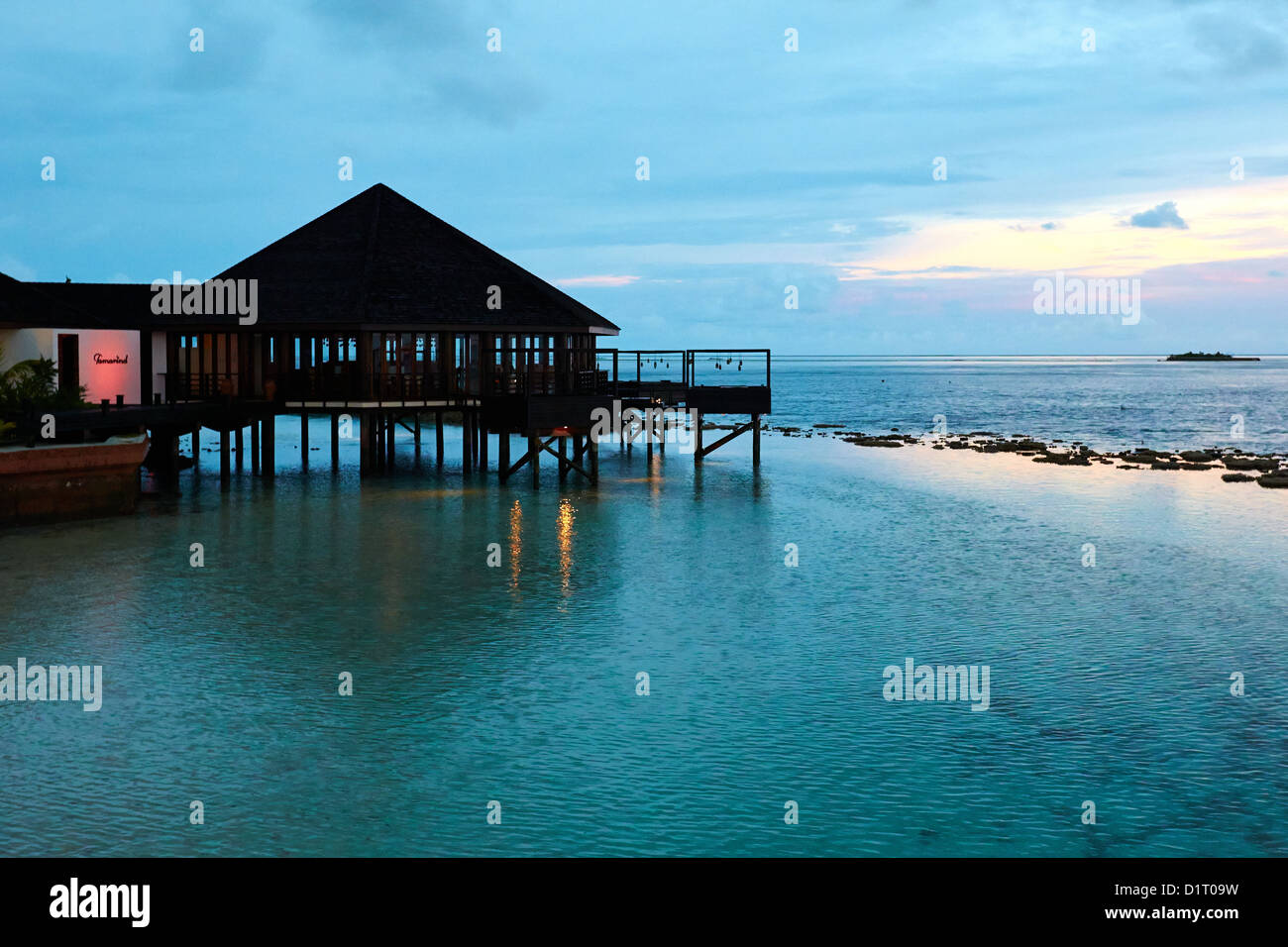 Over water restaurant at night in the Maldives Stock Photo - Alamy