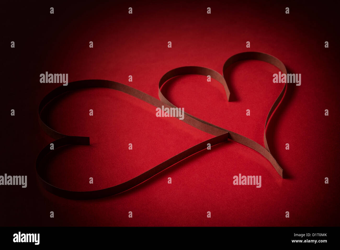 two paper hearts on red, valentines day background Stock Photo - Alamy