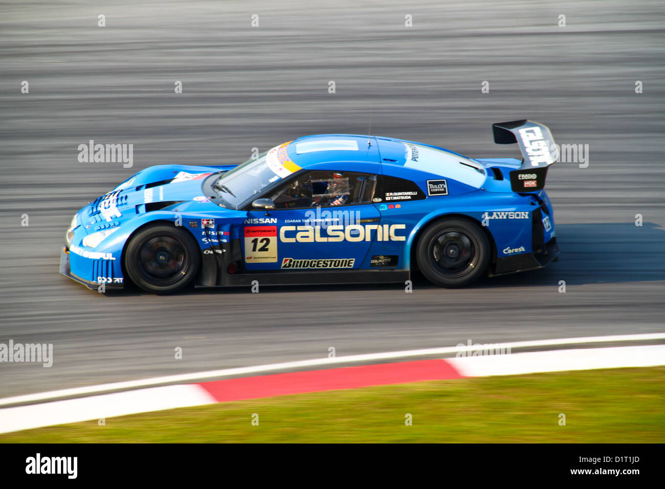 Calsonic Nissan car competing at Super GT race on June 20, 2010 in ...
