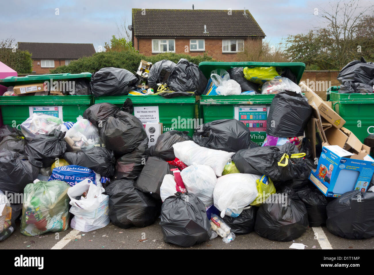 Overflowing recycling waste bins hi-res stock photography and images ...