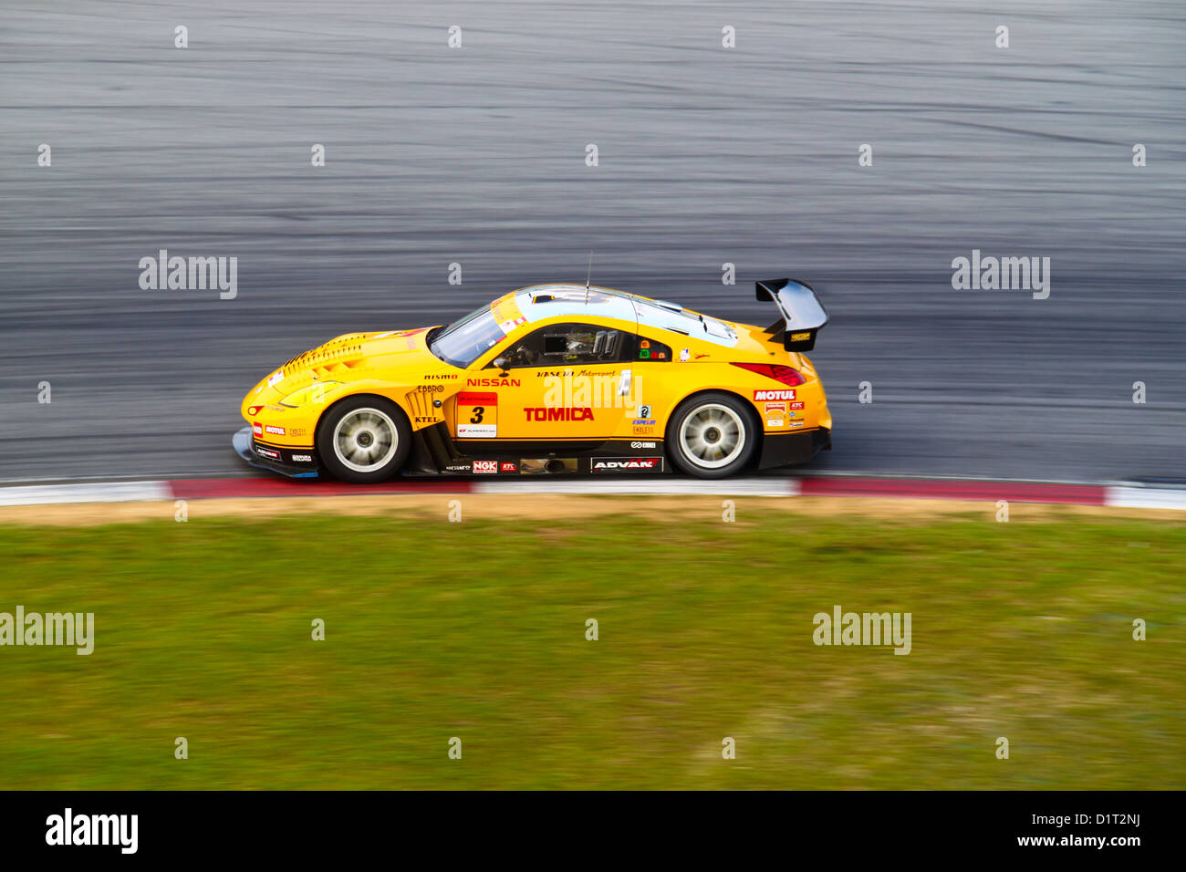 Hasemi Nissan car competing at Super GT race on June 20, 2010 in Sepang ...