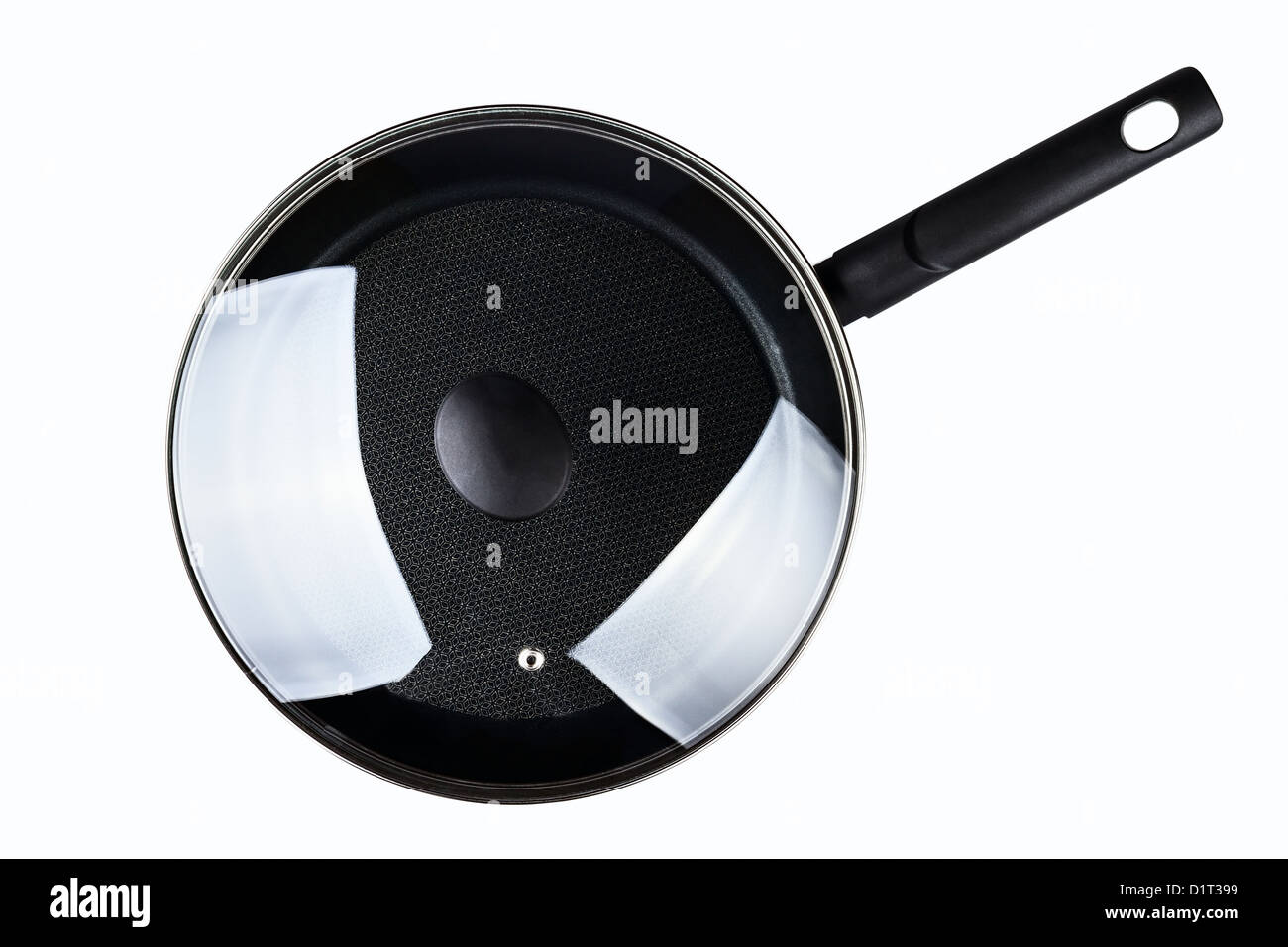 Frying pan with a teflon covering isolated on a white background Stock ...