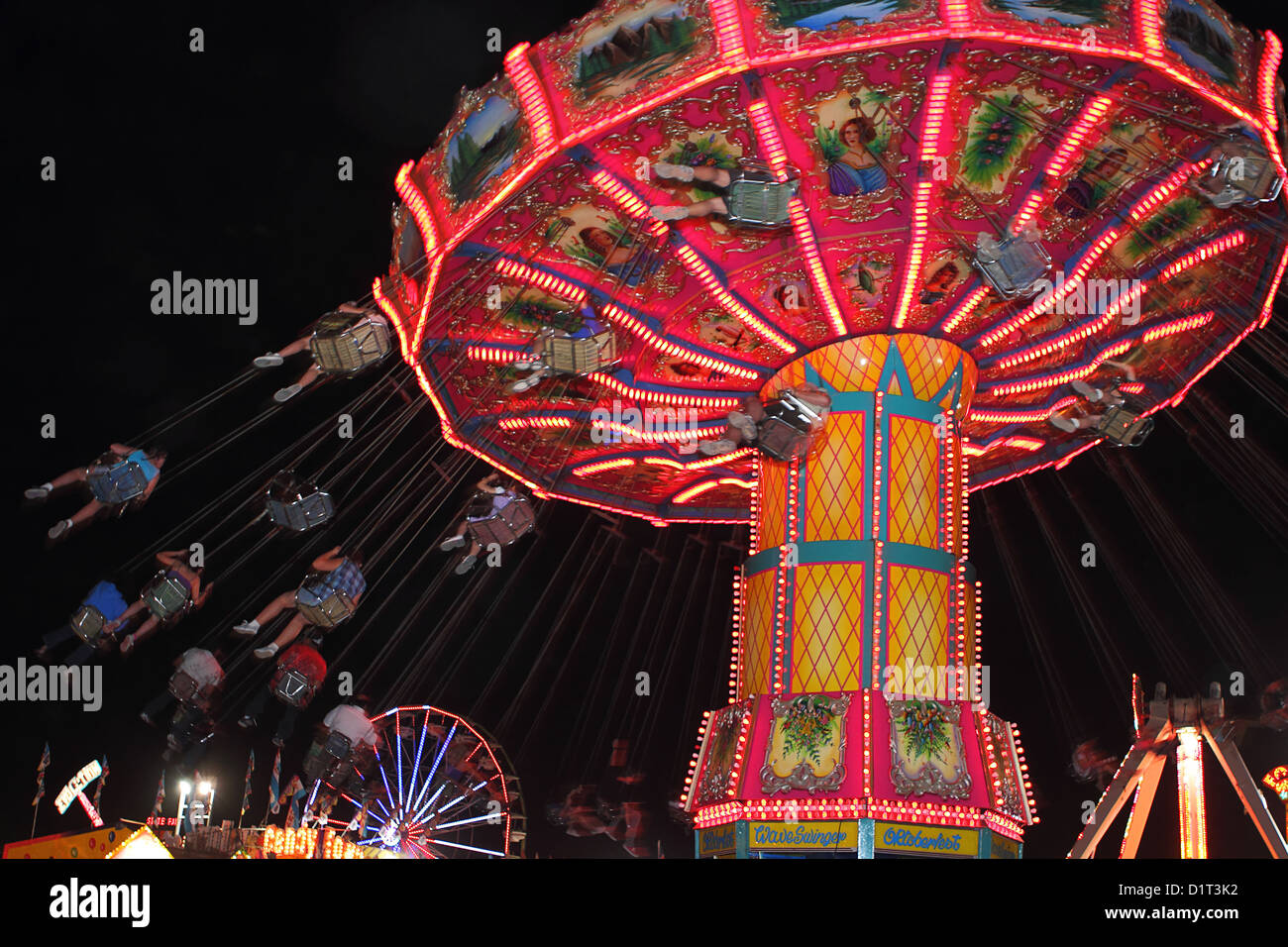 Amusement park marry-go-round ride Stock Photo - Alamy