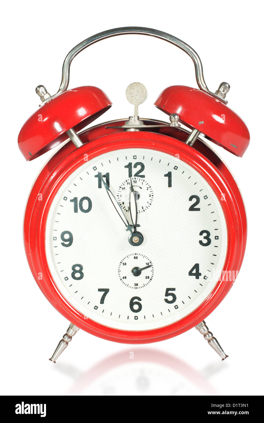 Old style alarm clock over white background Stock Photo - Alamy