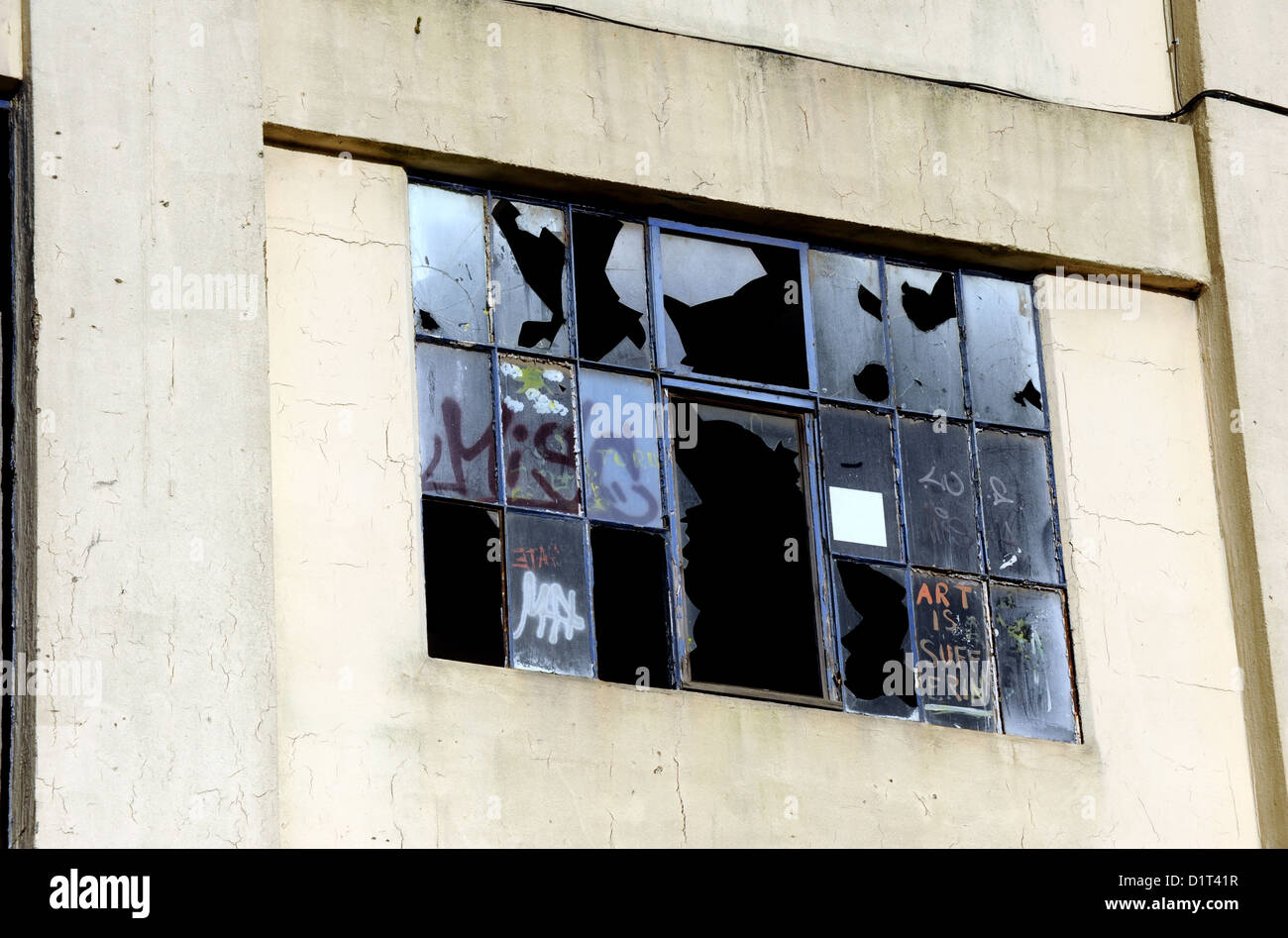Ipswich UK - Broken smashed windows in a derelict building Stock Photo ...