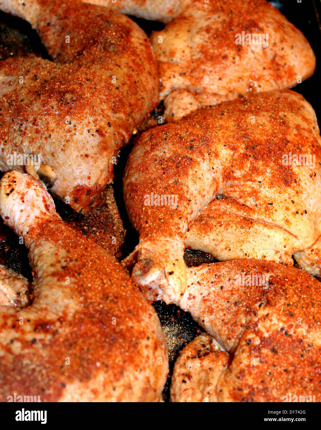 Raw seasoned chicken legs hi-res stock photography and images - Alamy