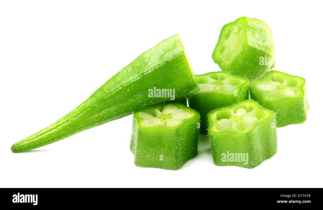 Okras on white background Stock Photo - Alamy