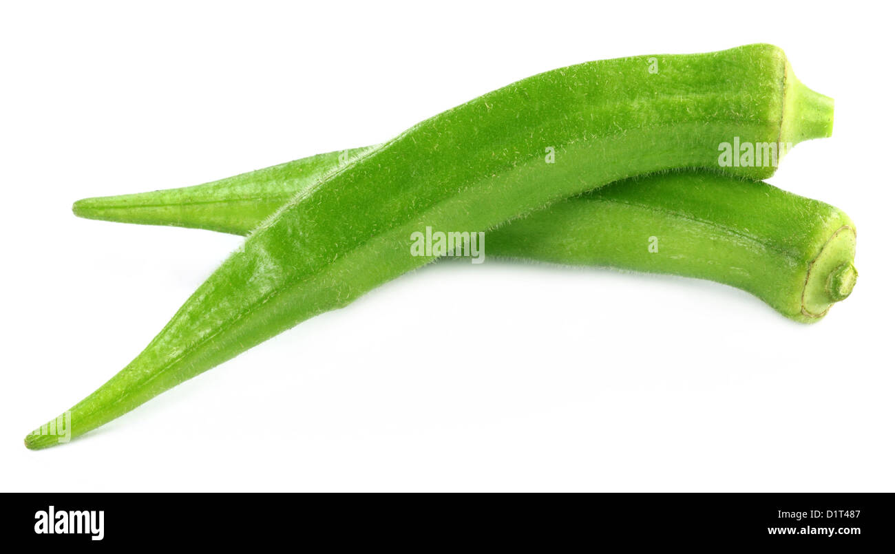 Okras on white background Stock Photo - Alamy