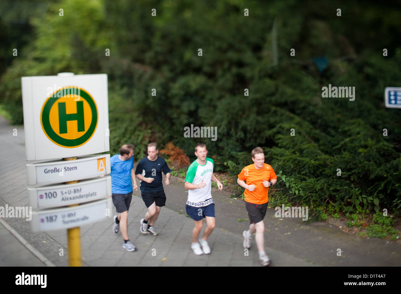 Berlin, Germany, young men jogging in Tiergarten Stock Photo - Alamy