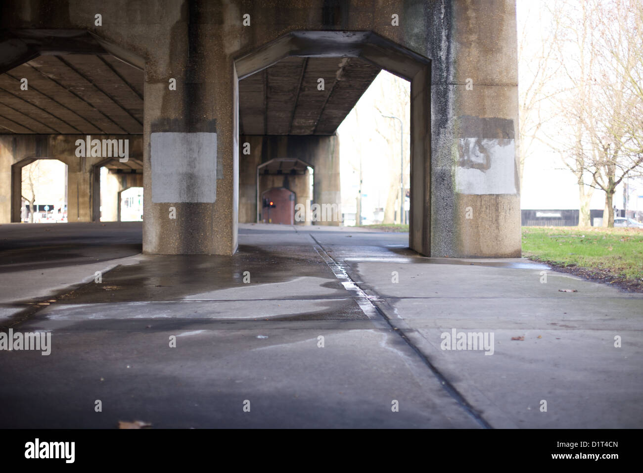 underneath a large road bridge Stock Photo - Alamy