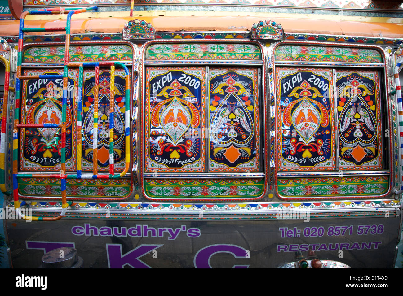 Enamelled colourful design on Indian bus Stock Photo - Alamy