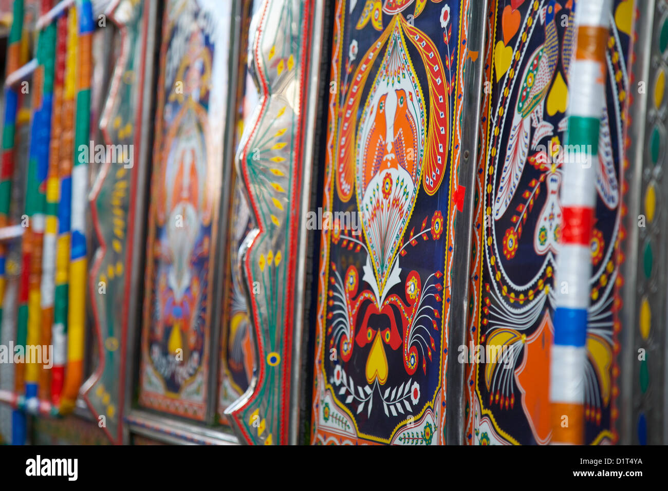 Enamelled colourful design on Indian bus Stock Photo - Alamy
