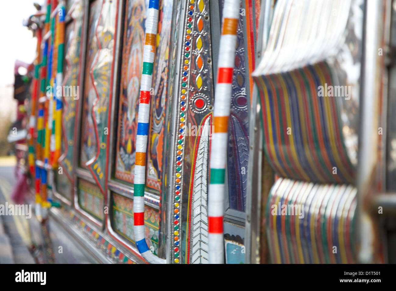 Enamelled colourful design on Indian bus Stock Photo - Alamy