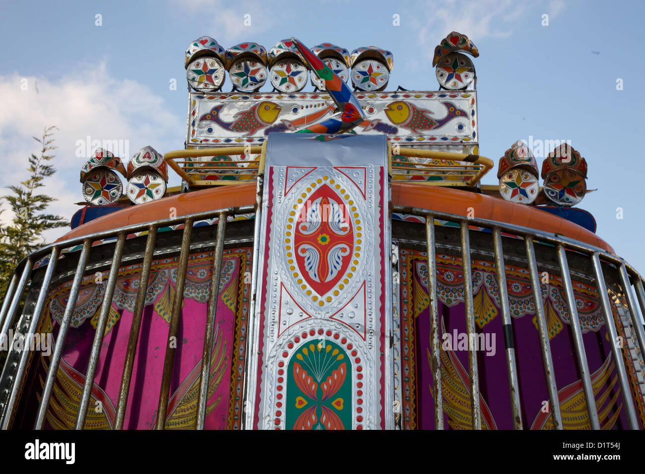 Enamelled colourful design on Indian bus Stock Photo - Alamy