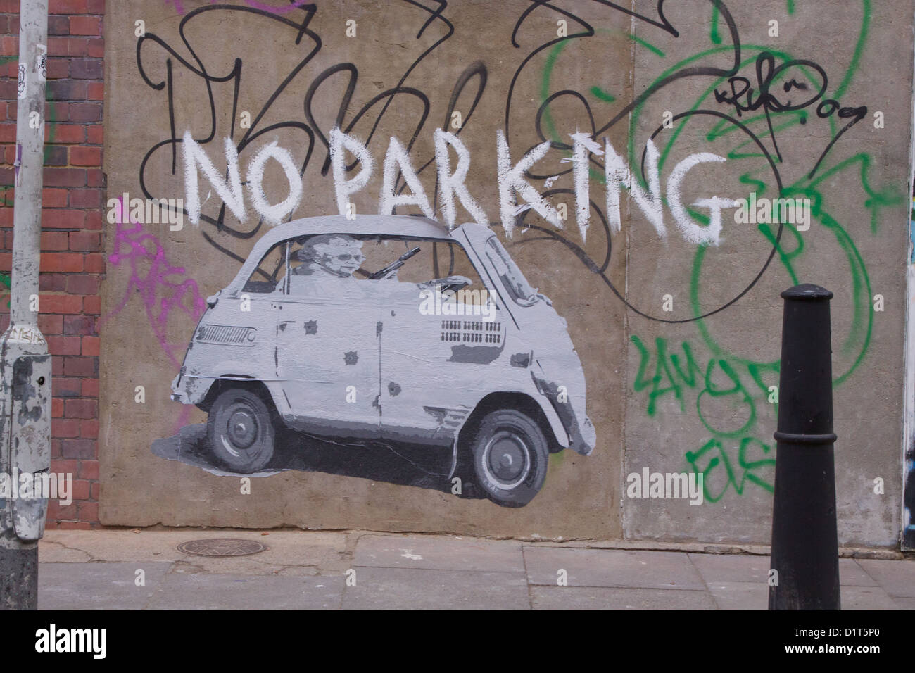 Graffiti of Queen in Fiat 500 with "No Parking" above it! Stock Photo ...