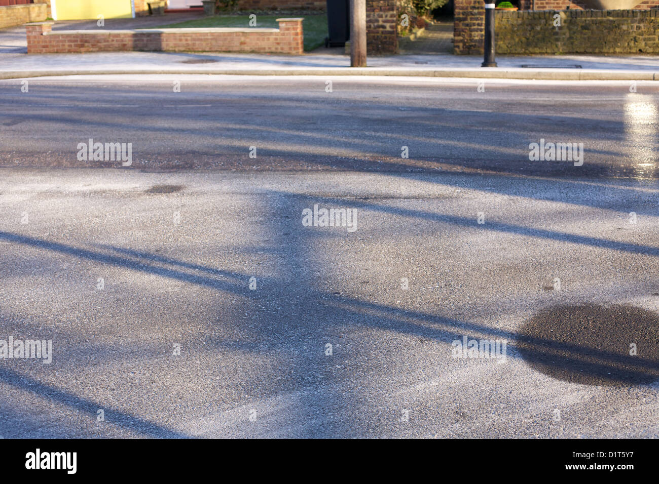 Frosty road with long shadows in color Stock Photo - Alamy