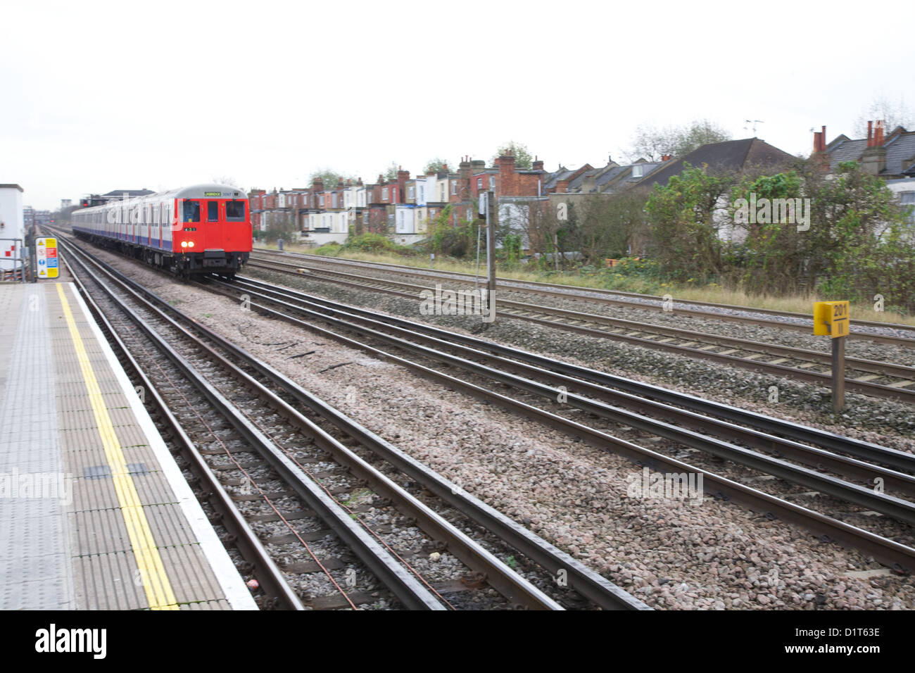Approaching Metropolitan line train on London underground, above ground ...
