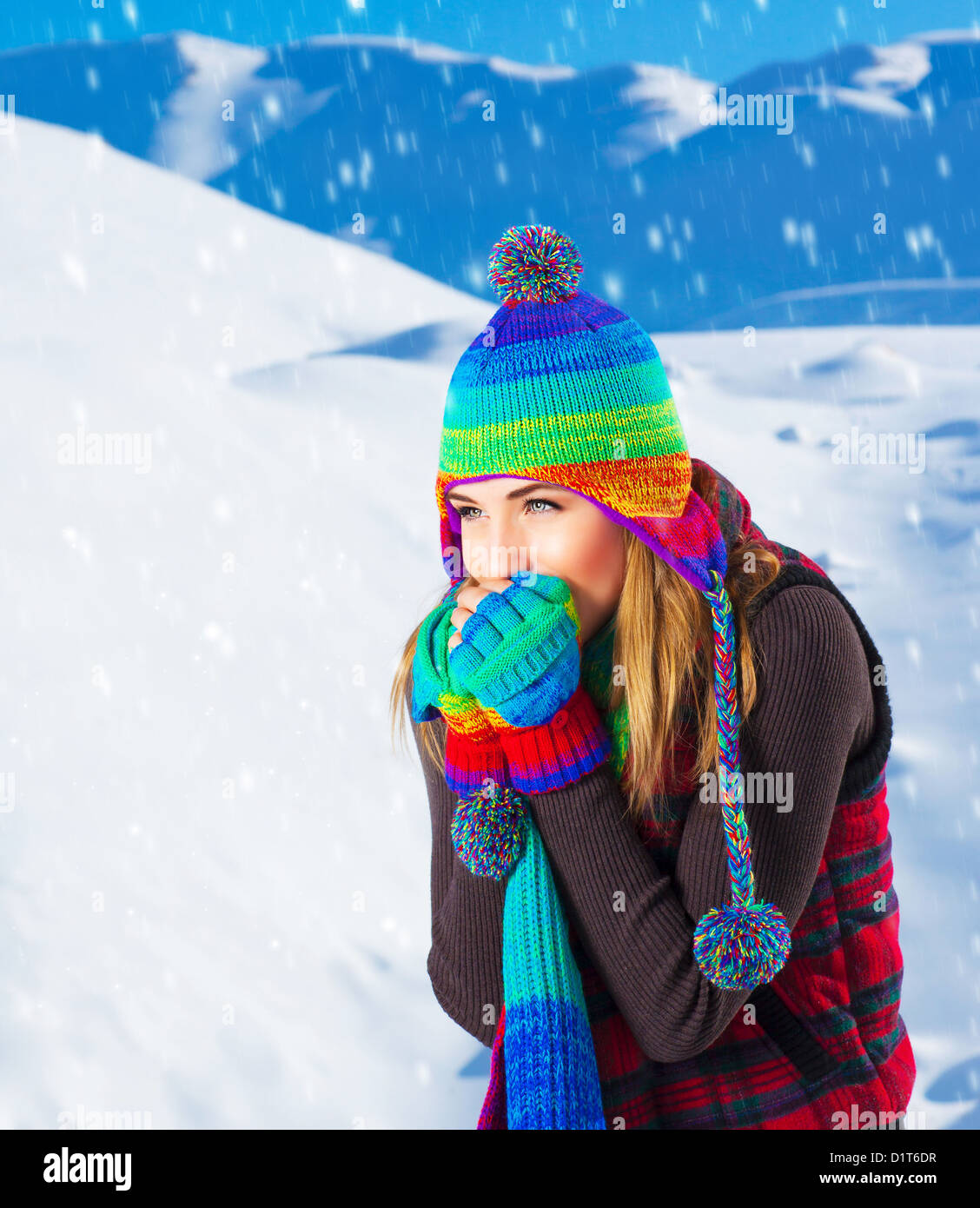 Picture of cute female in winter mountains, snowfall outdoors ...