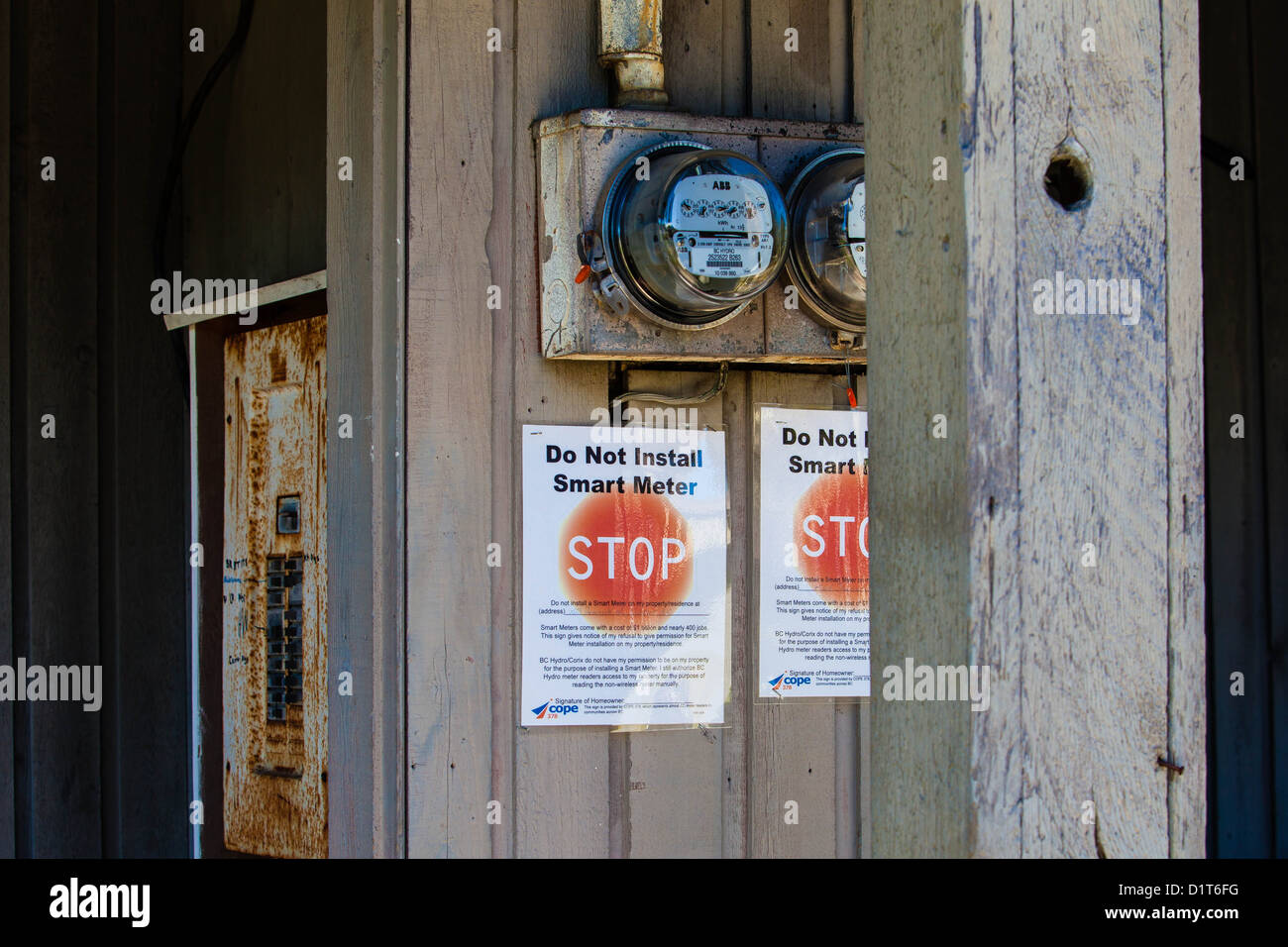 Old rotary electricity meters and posters. Do not install smart meter ...