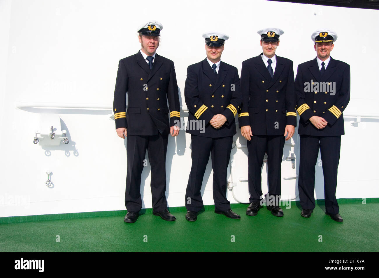 Warnemuende, Germany, Captain Klaus Bergmann and three officers on the ...