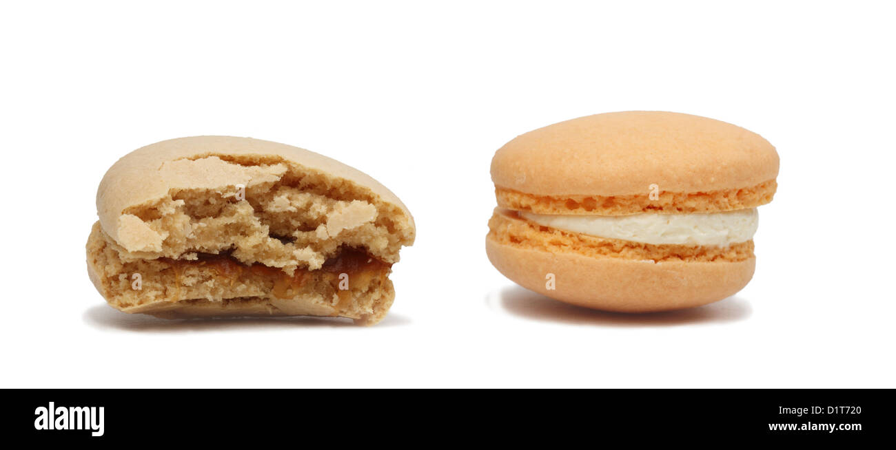 Image of two macarons over a white background. One of them is with a ...