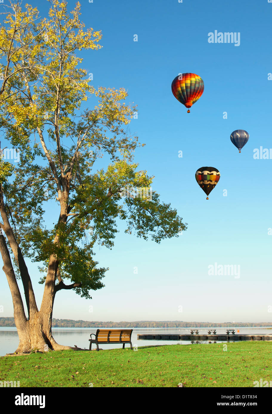 lake with hot air balloons scene Stock Photo - Alamy