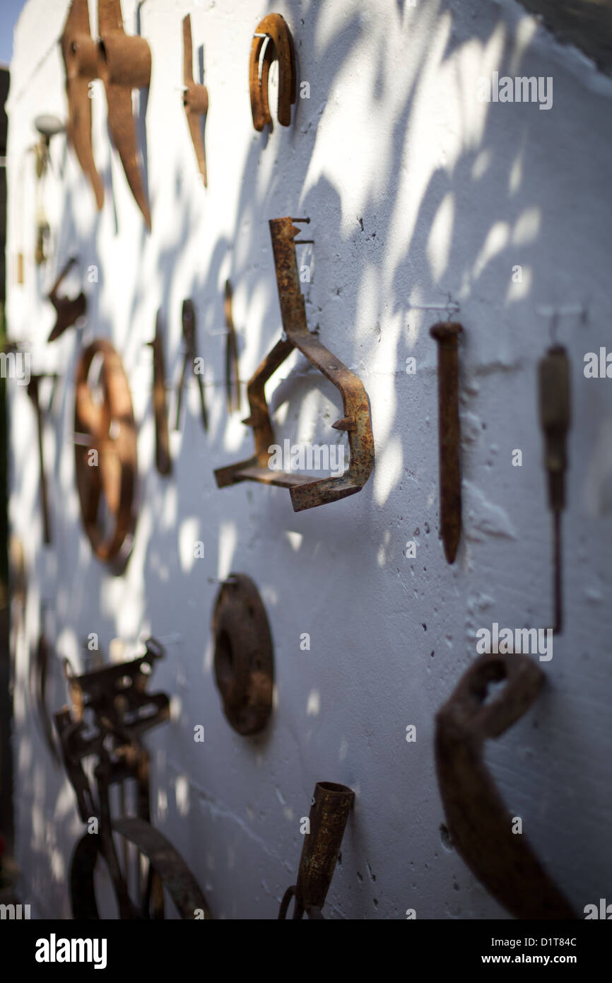 Old farm tools hanging on a wall hi-res stock photography and images ...