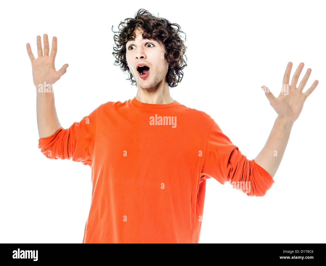 one young man gesturing surprised portrait in studio white background ...