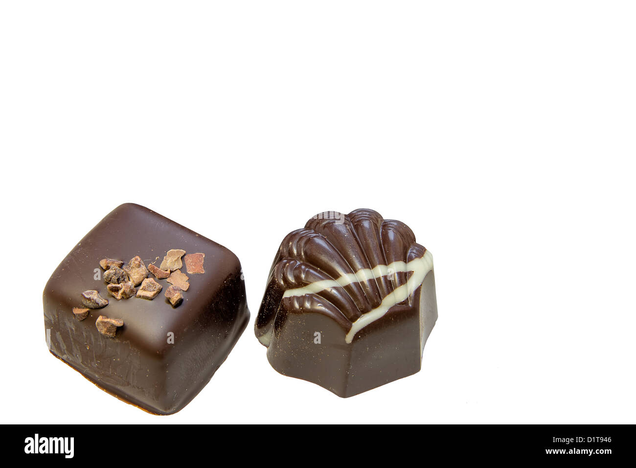 Dark Chocolate Truffles Square and Scallop Shaped Isolated on White ...