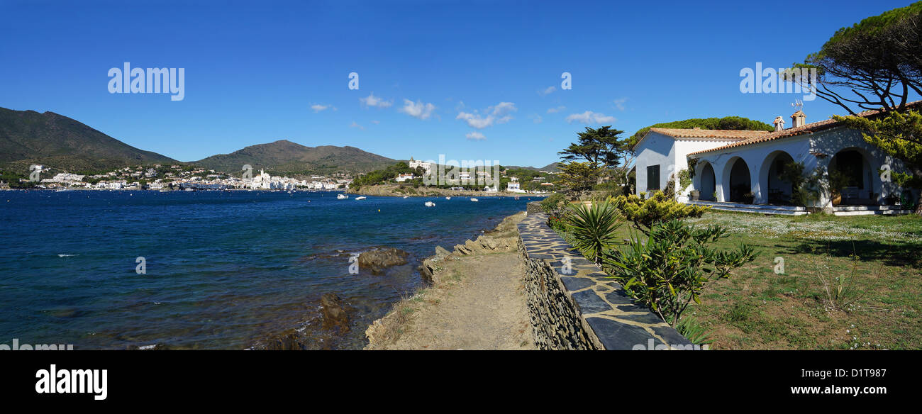 Panorama over the Mediterranean village of Cadaques with a waterfront ...