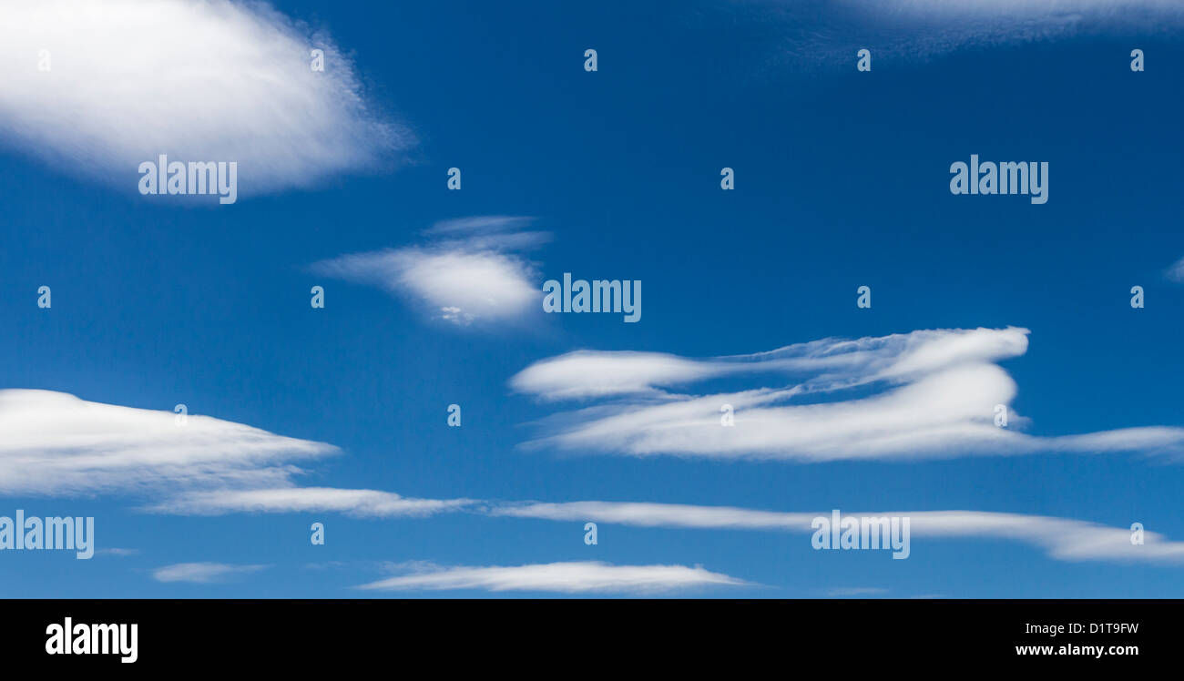 Unusual formations of Cirrus Uncinus cloud formations Stock Photo - Alamy