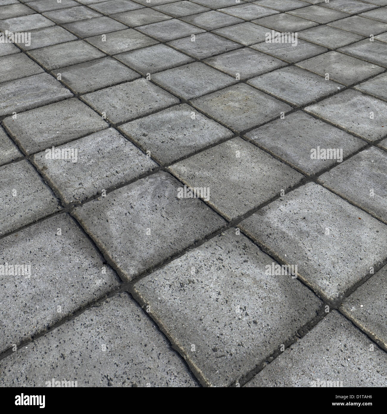 3d render of square pavement tiles in gray stone concrete Stock Photo ...