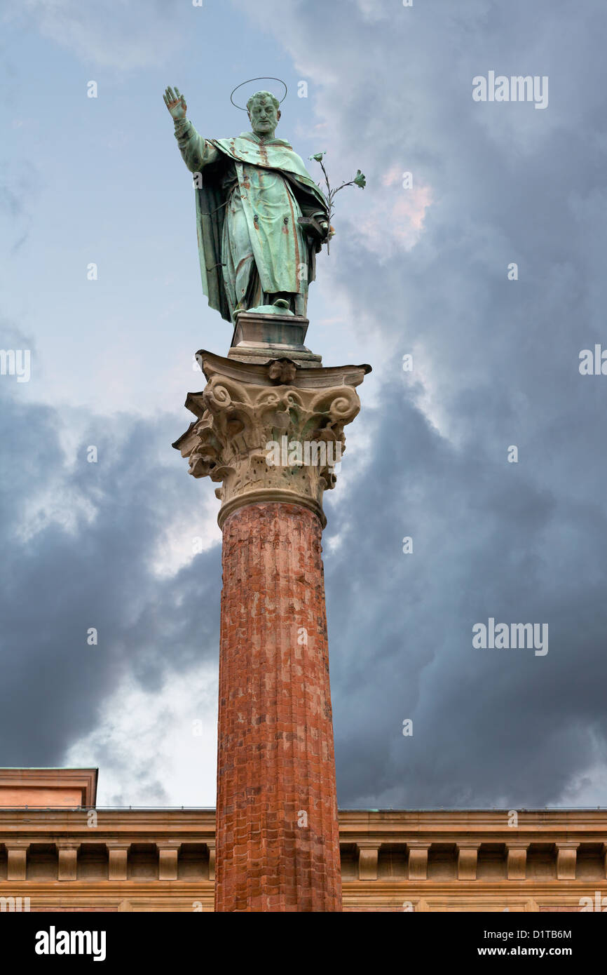 statue and column of Saint Dominic near Basilica of San Domenico with ...
