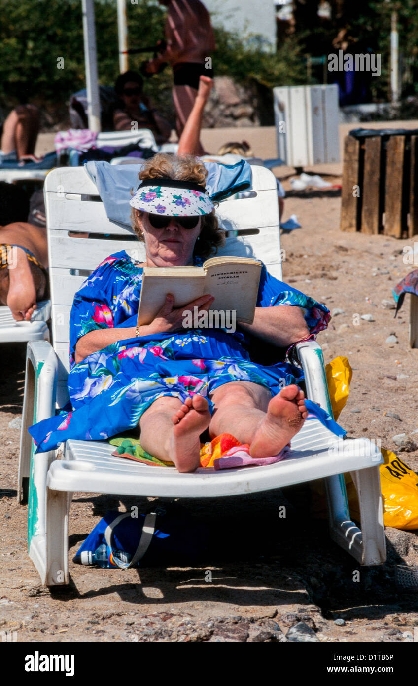 Vacation on the beach in a beach chair hi-res stock photography and ...