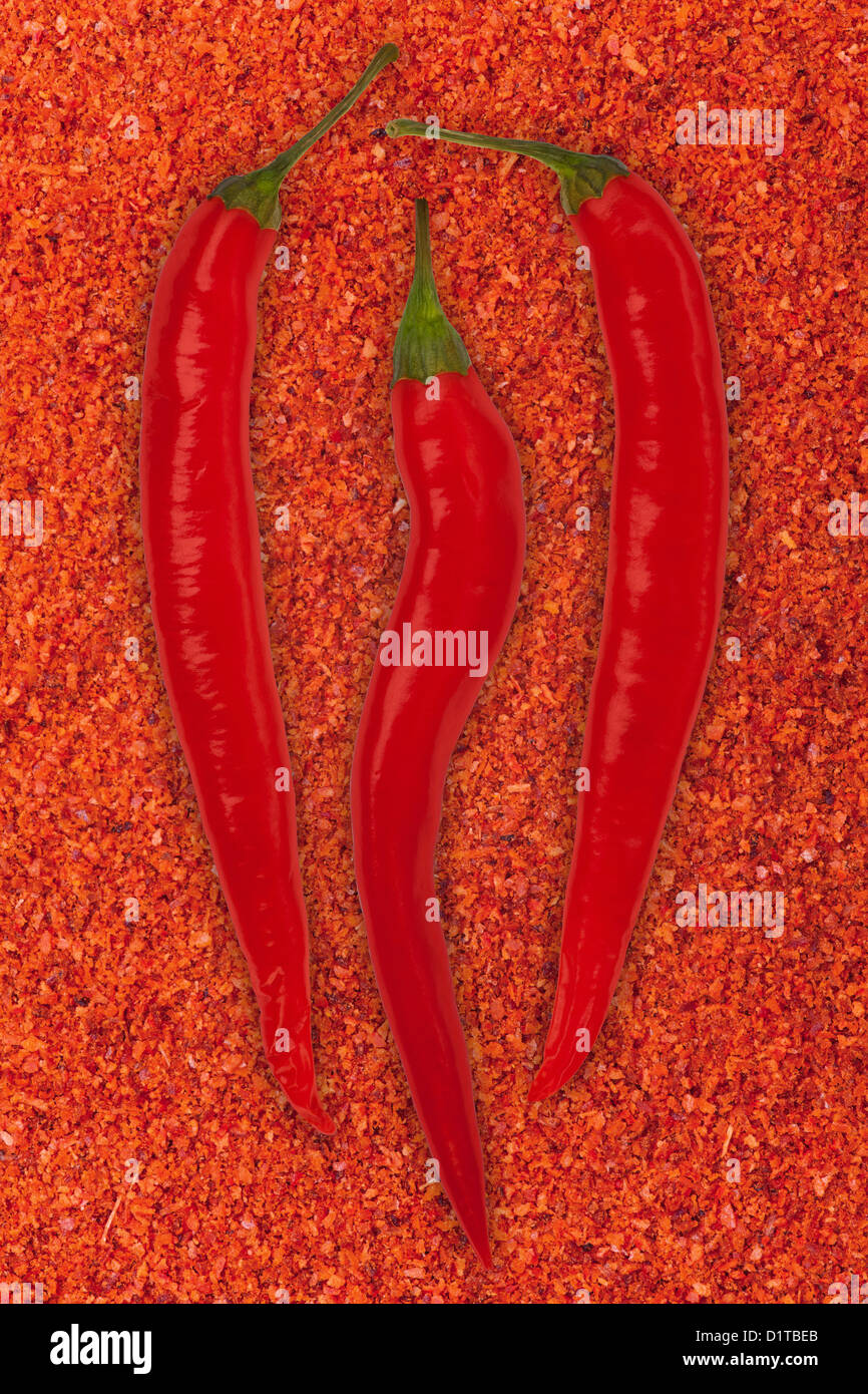 red chili pepper on chili powder background, food backdrop Stock Photo ...
