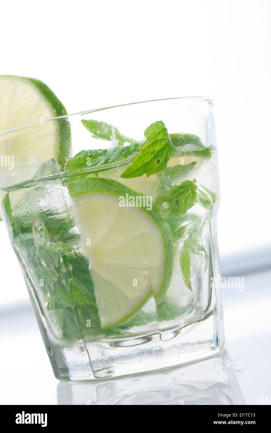Mojito glass against white background with cold green colors Stock ...